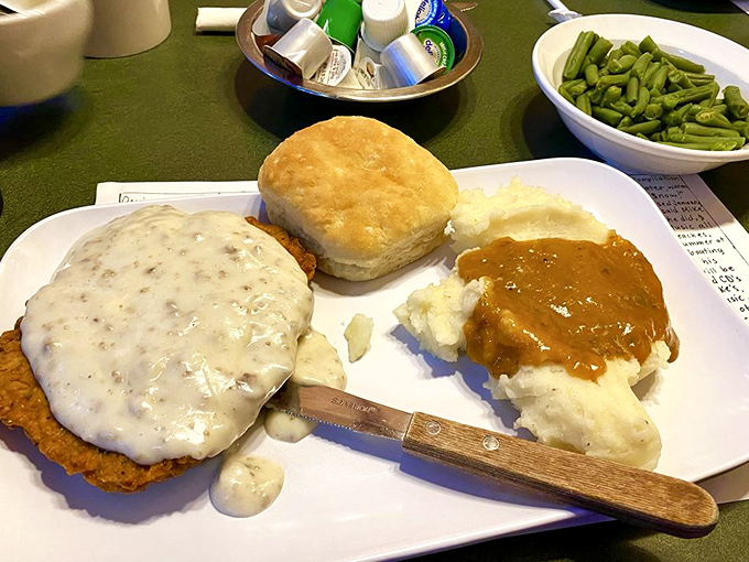 Country fried steak with gravy so good you'll want to write home about it. The biscuit isn't just on the side&mdash;it's there to soak up every last drop.