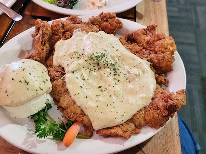 This chicken fried steak with country gravy is Oklahoma's answer to comfort food &ndash; a crispy, creamy masterpiece that hugs your soul.