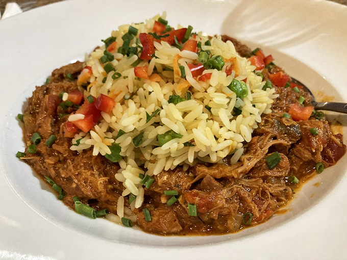 This creamy chicken dish, dotted with vibrant red peppers, isn't just dinner&mdash;it's a spiritual experience that warms the soul and delights the palate. 