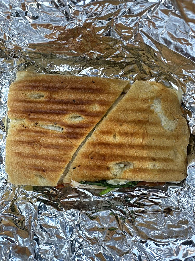 The chicken and prosciutto sandwich that makes lunch breaks feel like mini-vacations to Tuscany. Worth every crumb that inevitably lands on your shirt.