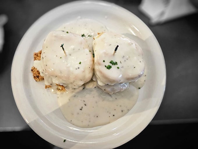 Two biscuits swimming in black pepper gravy &ndash; comfort food so satisfying it could end international conflicts.