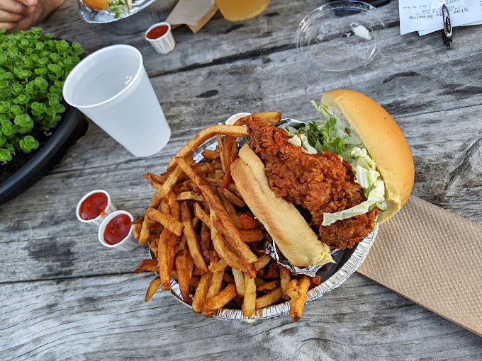 Fried chicken sandwich perfection&mdash;crispy exterior, juicy interior, and enough fries to share (though you probably won't want to).
