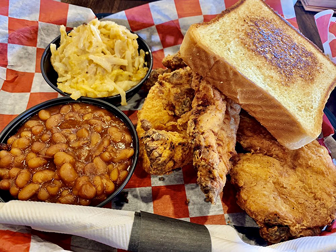 Fried chicken that actually deserves the word "crispy," with sides that understand their role in this golden, crunchy theater of comfort.