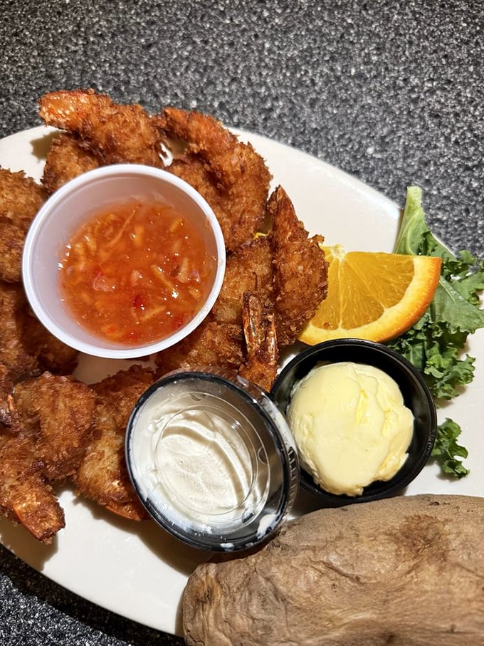 Coconut shrimp that could make a seafood skeptic change teams. Crispy, golden, and served with dipping sauces that demand to be explored.