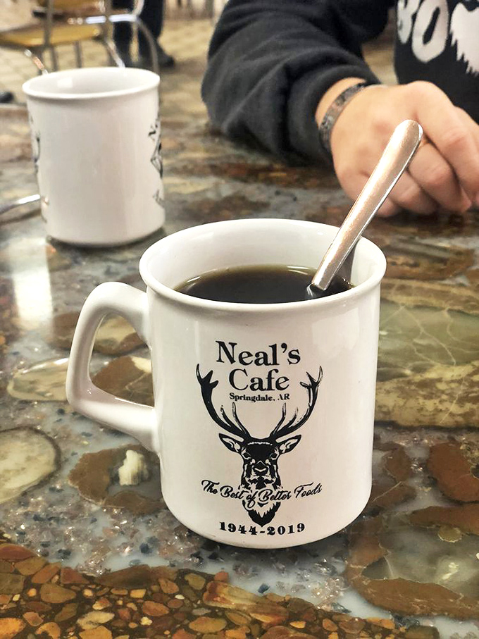 The official chalice of Neal's Cafe &ndash; strong coffee served in a mug substantial enough to survive the apocalypse, antlers included.
