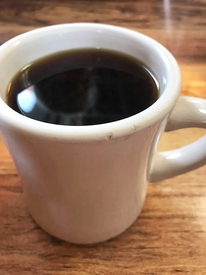 The humble diner coffee mug—holding what might be the world's most important liquid before 10 AM. No foam art needed.