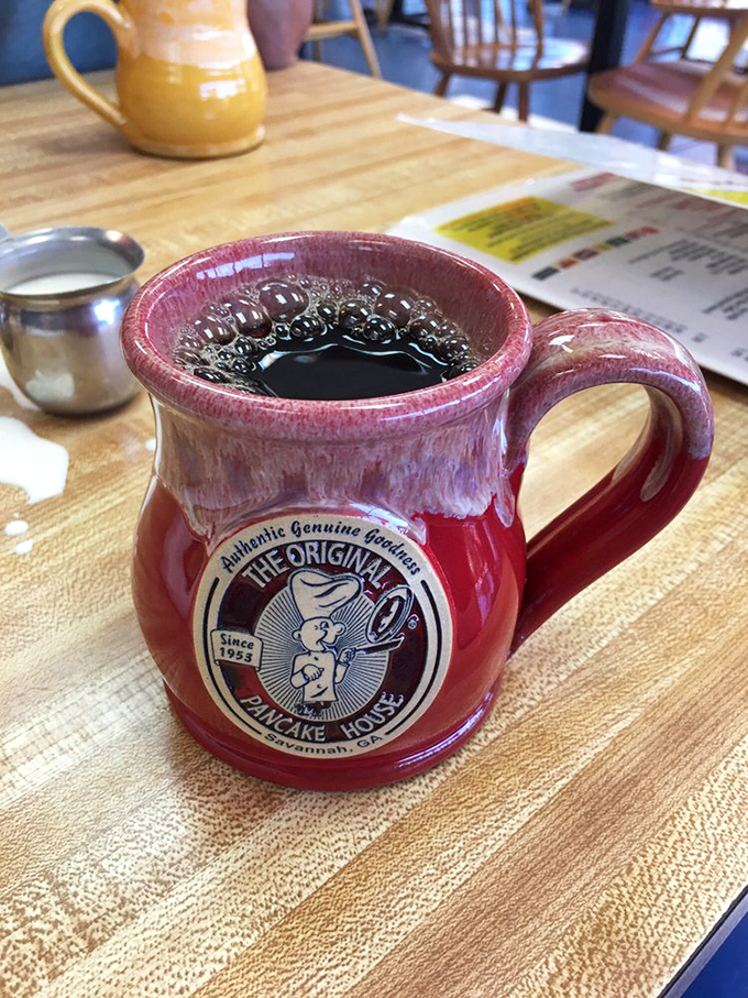 The unofficial fuel of morning conversations, served in a mug that's practically begging to become your souvenir. Coffee with character!