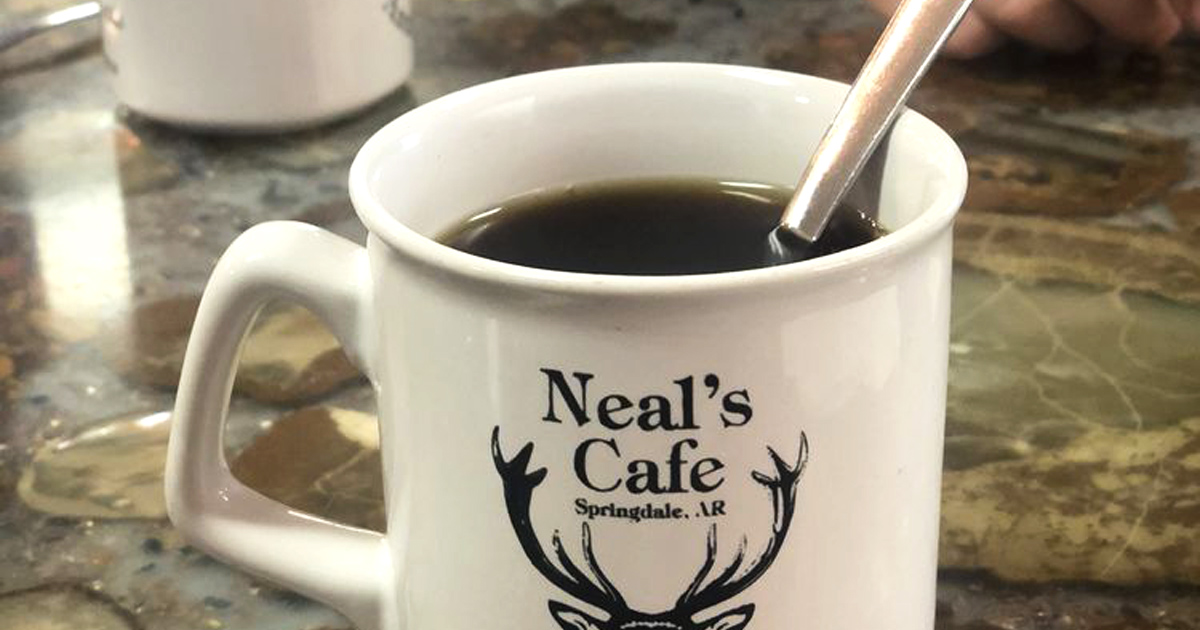 The official chalice of Neal's Cafe &ndash; strong coffee served in a mug substantial enough to survive the apocalypse, antlers included.