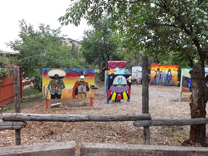 Folk art cutouts create a whimsical photo opportunity. Madrid's version of Instagram bait existed long before social media, proving creativity always finds an audience.