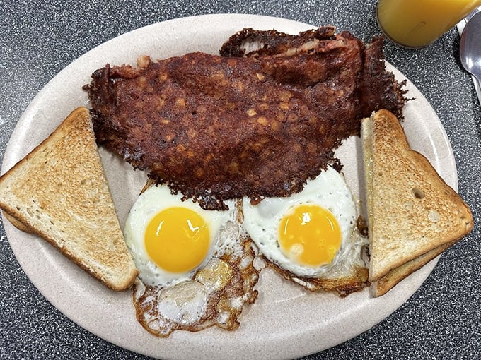 That crispy-edged corned beef hash with sunny eggs is what breakfast dreams are made of. Your diet can start tomorrow.