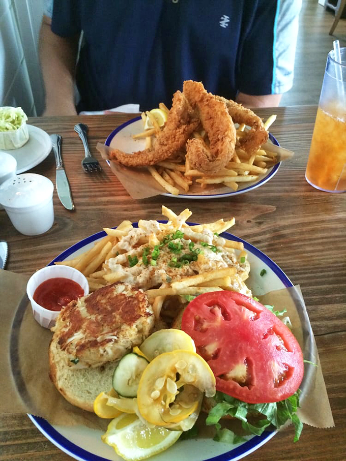 A crab cake sandwich that passes the Maryland border test &ndash; minimal filler, maximum flavor, and fries dusted with what must be seafood fairy dust.