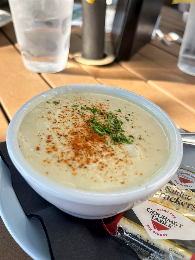 This Cream of Crab soup, dusted with paprika and fresh herbs, isn't just a starter &ndash; it's the opening act that threatens to upstage the entire show.