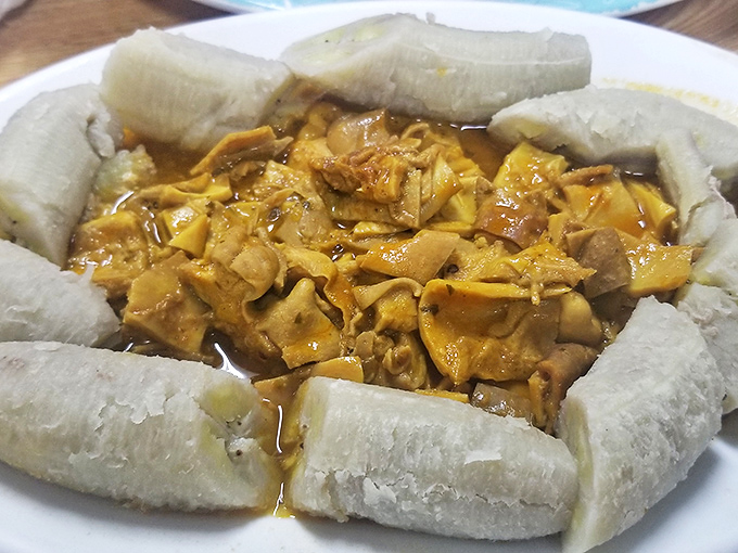 Mofongo surrounded by plantains&mdash;a starchy throne for royally good flavor. The kind of dish that makes you go silent except for the occasional "mmm." 