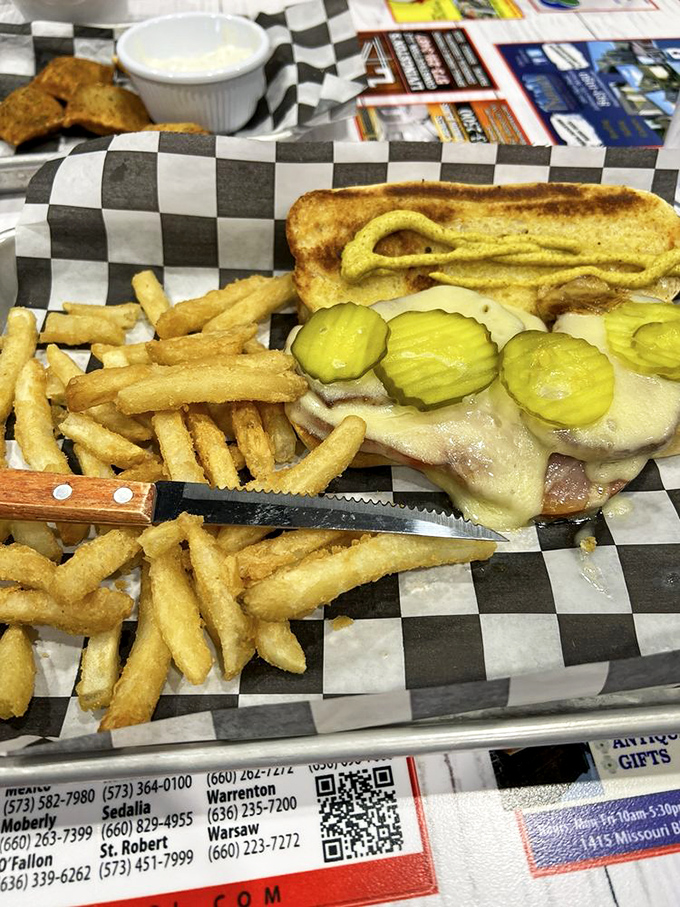 Even sandwiches get the royal treatment—crispy fries flank a treasure of melted cheese and pickles on toasted perfection.