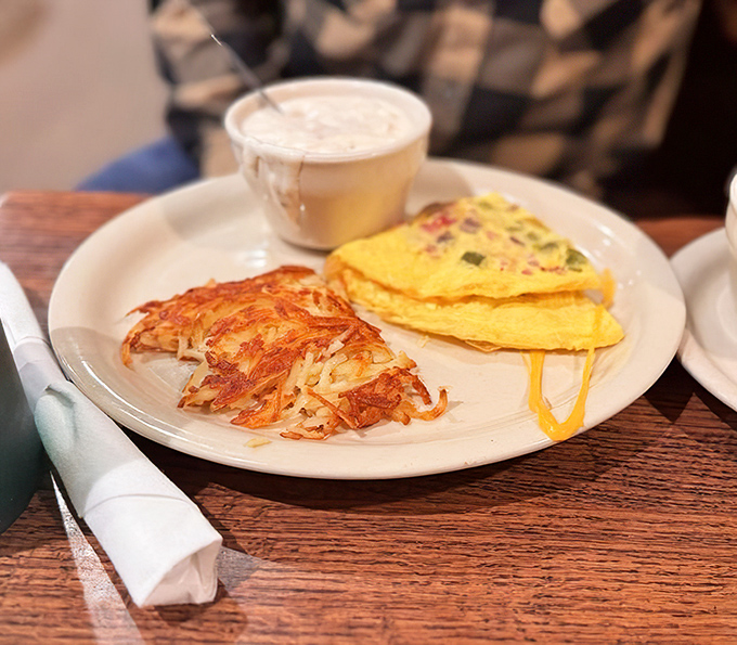 A Denver omelet that's fluffy enough to use as a pillow, if you weren't too busy devouring it with those perfectly crispy hash browns.