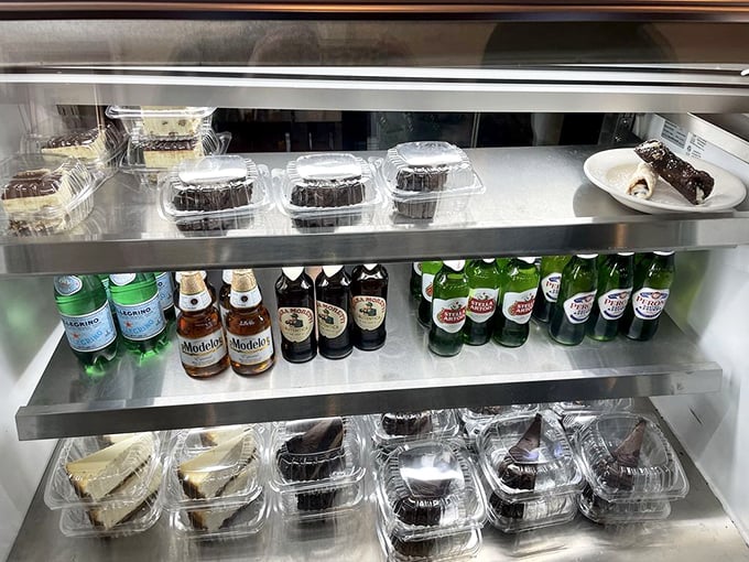 The dessert case: where willpower goes to die. Those cannoli and Italian beers are plotting against your best intentions, and resistance is futile.