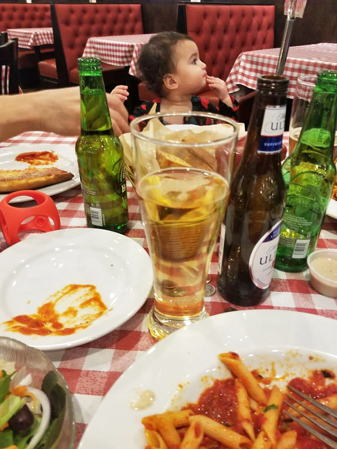 Family dining as it should be&mdash;sauce-stained plates, half-empty glasses, and the unmistakable evidence of a meal thoroughly enjoyed.
