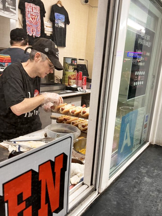 Behind every great hot dog stands a dedicated craftsperson. Watching them work is like seeing a conductor lead a meaty symphony.