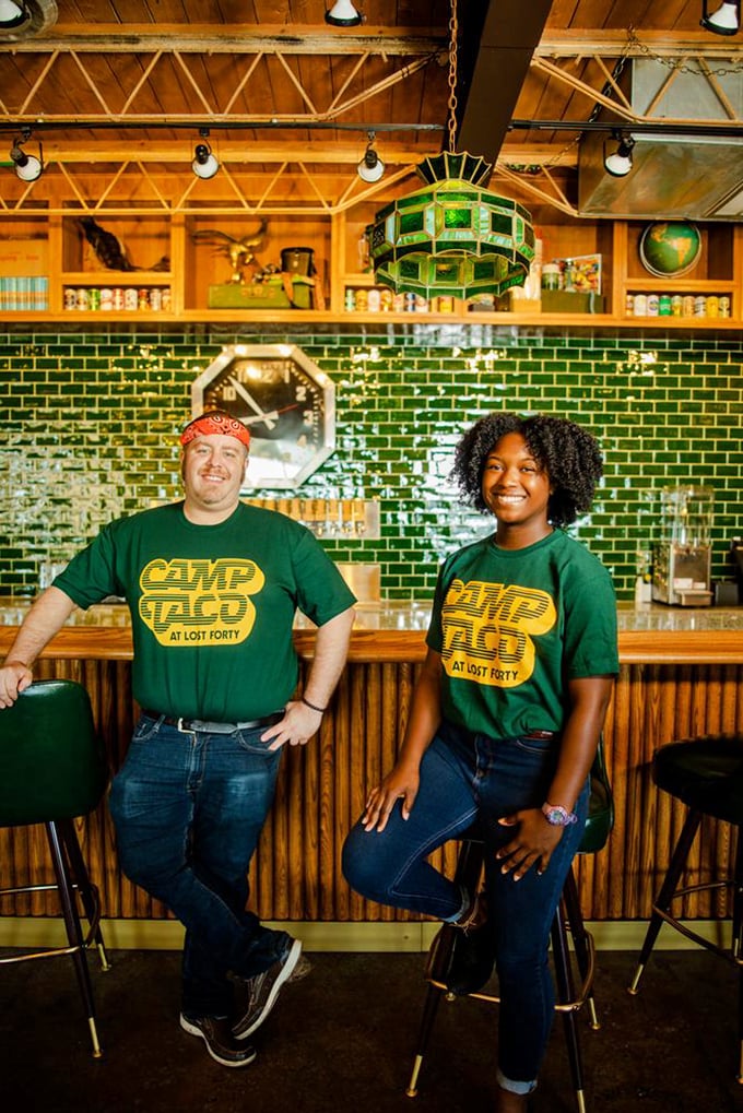 The friendly faces behind Camp Taco's magic. Their green shirts are as bright as their service, making every visit feel like a homecoming.