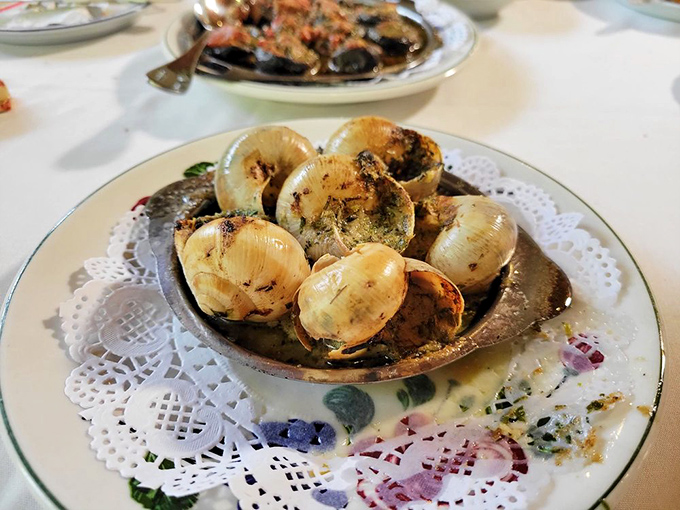 Escargot: where butter, garlic, and courage meet. Trust me, these little guys are the gateway drug to French cuisine.