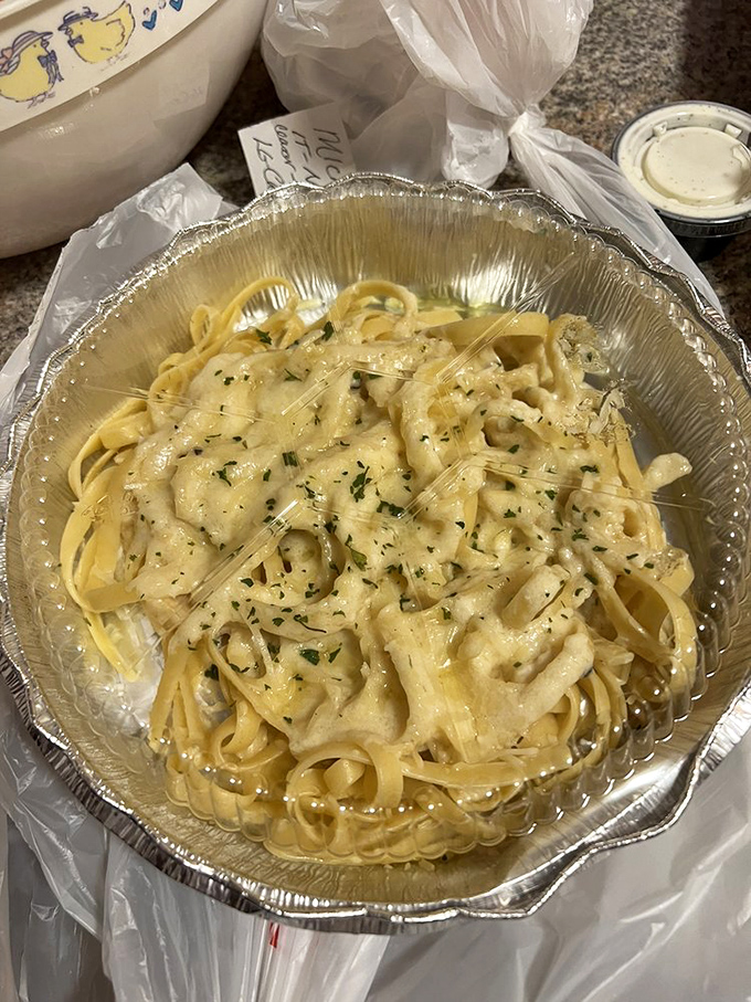 Fettuccine Alfredo so creamy it should come with a warning label: "May induce spontaneous sighs of contentment and requests for larger pants."