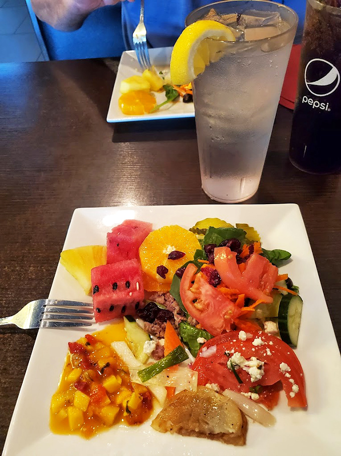 Not all heroes wear capes—some come on white plates with fresh fruit and a perfectly dressed salad. The palate cleanser you need between meat marathons.