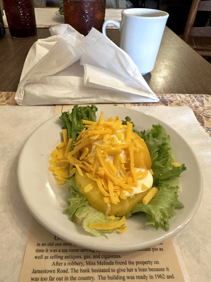 A cheerful reminder that "eating healthy" doesn't have to be punitive&mdash;this fruit salad with cheese looks like sunshine on a plate.