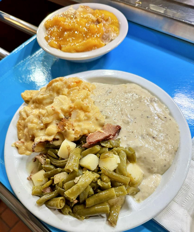 A symphony of southern comforts on a single blue tray. In a world of small plates and tasting menus, this is refreshingly straightforward abundance.