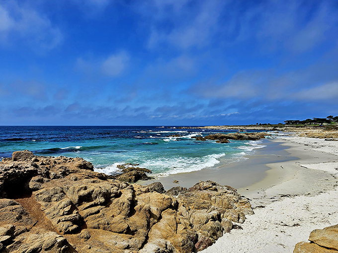 Sun-kissed sand meets sapphire waters at this hidden beach cove, where every grain of sand seems to whisper, "Slow down, you're on vacation now."