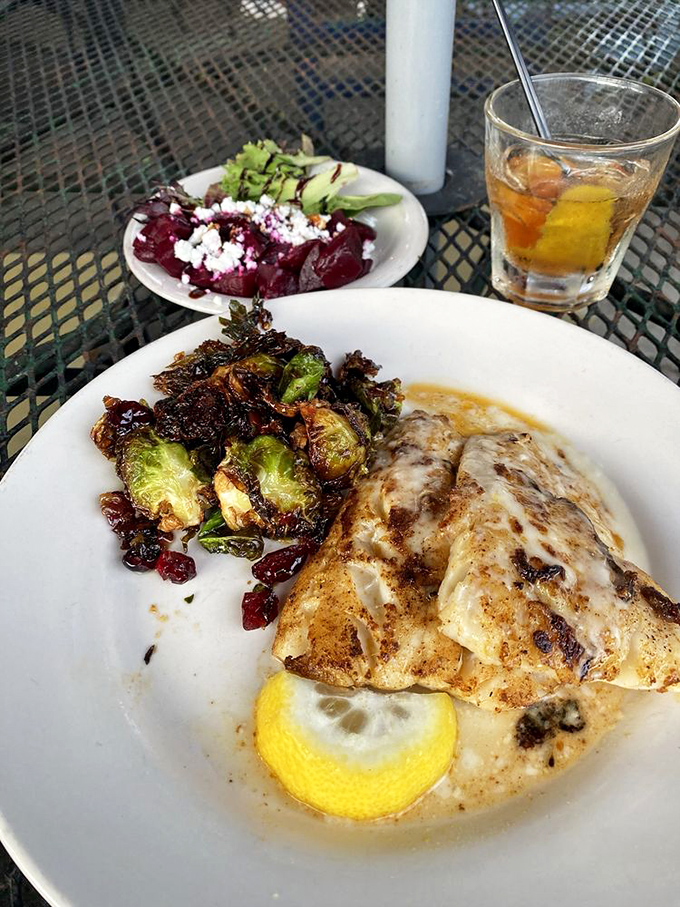 Grilled cod so perfectly cooked it practically sparkles, served with crispy Brussels sprouts. Fish this good doesn't need a passport to impress.
