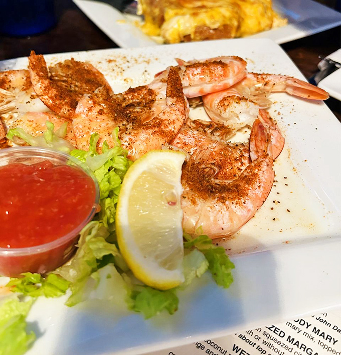 Grilled shrimp dusted with spices and served with cocktail sauce&mdash;the ocean's perfect gift packaged with just enough heat to wake up your taste buds.