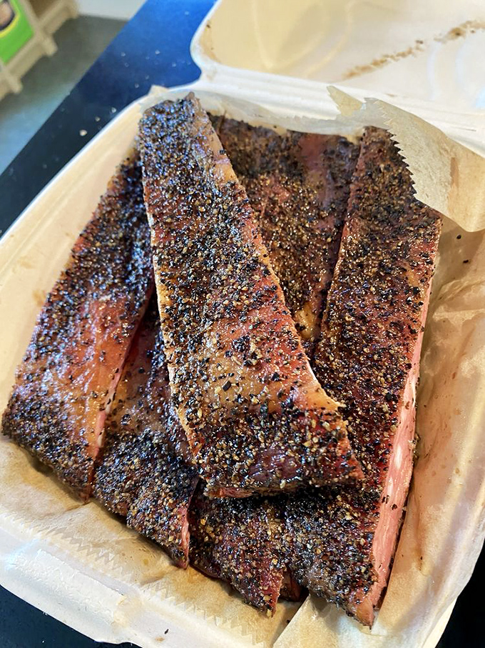 These spare ribs with their glistening exterior and rosy interior are what barbecue fantasies are made of. Paired with pickled vegetables for that perfect acid balance. 