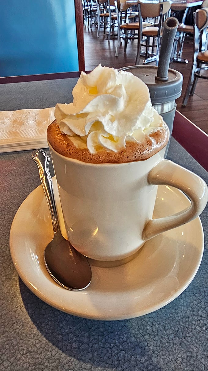 Hot chocolate that doesn't just come with whipped cream&mdash;it comes with a mountain of it. Winter blues, consider yourself defeated.