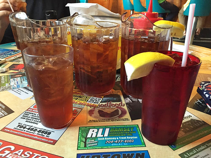 Sweet tea served in those classic ridged glasses&mdash;the unofficial wine pairing for proper Southern barbecue and warm afternoon conversations.