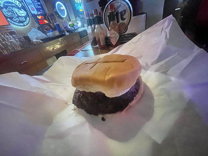 Simplicity in its purest form&mdash;a humble bun, a perfectly grilled patty, and somewhere inside, a treasure trove of melted American cheese.