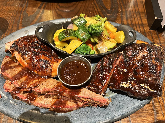 The Judge's Plate delivers the barbecue trifecta&mdash;ribs, brisket, and chicken with sides that don't merely complement but compete for your affection.