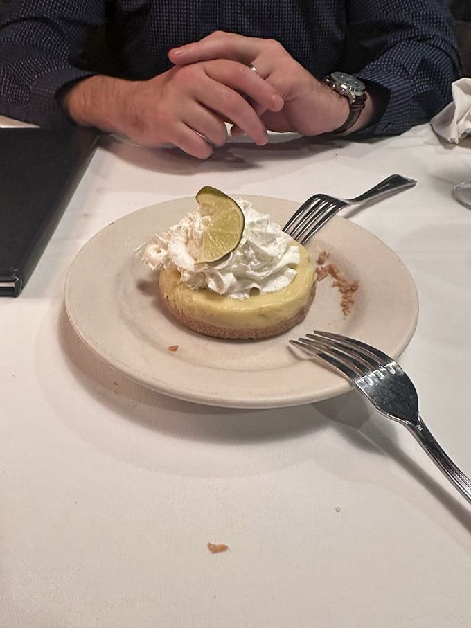 Key lime pie that strikes the perfect balance between sweet and tart &ndash; topped with a dollop of whipped cream and a hint of Florida sunshine.