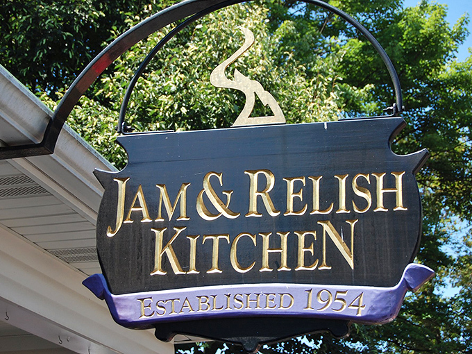 The Old Candle Barn glows with rustic charm even in daylight. This iconic red barn houses treasures that illuminate homes across America.