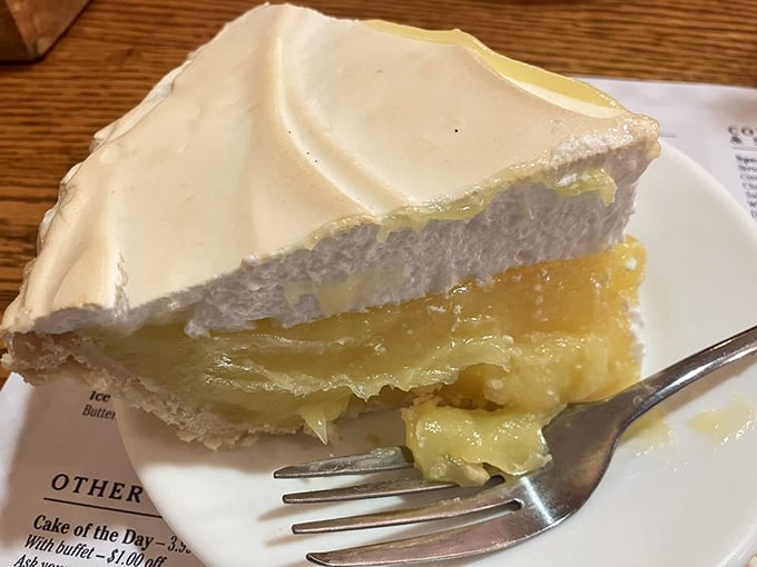 Lemon meringue pie that deserves its own spotlight. Sunshine-yellow filling supports a billowy white topping that's been bronzed to perfection.