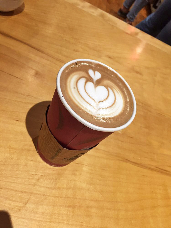 That heart-shaped latte art says "I love you" in the universal language of perfectly steamed milk and expertly pulled espresso.