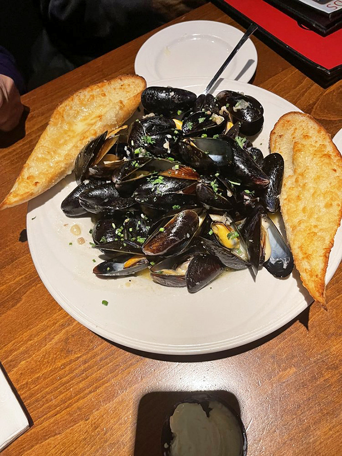 These mussels aren't just seafood&mdash;they're little black-shelled treasures bathing in a broth worth bottling and taking home.