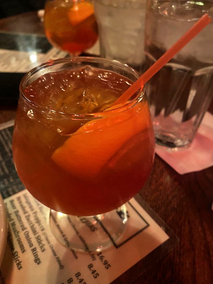 An old fashioned sporting its signature orange peel &ndash; the perfect companion for contemplating life's big questions or just tonight's dessert options.