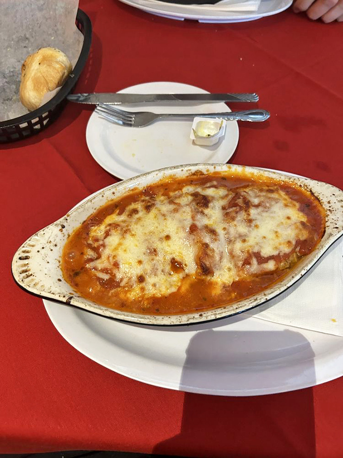 Bubbling cheese blankets this pasta sampler like a comfortable quilt on a winter evening. Comfort food at its most literal.