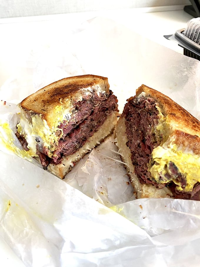 The Reuben at Slyman's isn't just a sandwich, it's a commitment &ndash; melted Swiss and sauerkraut elevating already perfect meat.