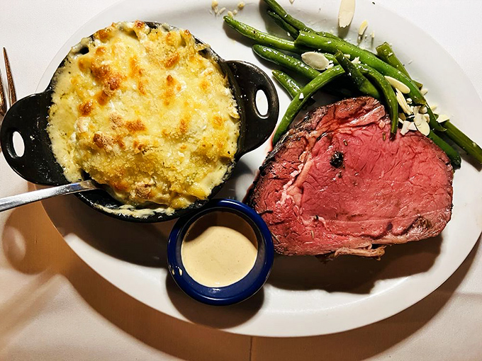 Prime rib so perfectly prepared it would make a vegetarian reconsider life choices. That side of mac and cheese isn't just comfort food&mdash;it's a revelation.