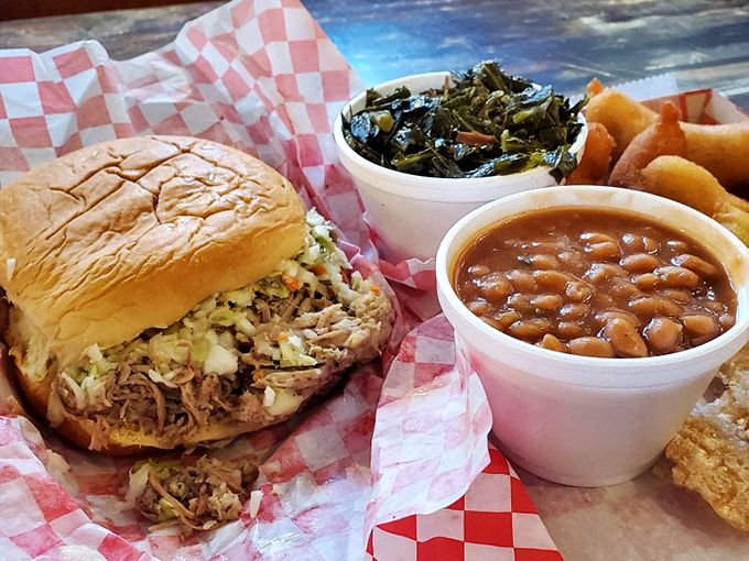 A pulled pork sandwich that doesn't need fancy toppings to shine &ndash; just meat, slaw, and a bun that knows its supporting role in this meaty masterpiece.