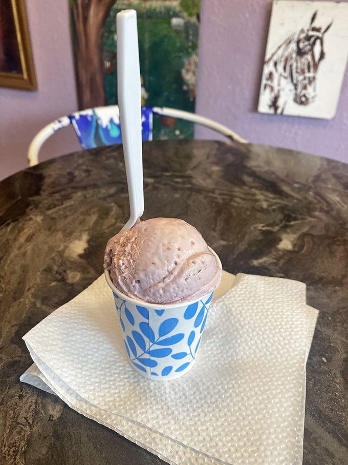 This scoop has the same soft pink hue as the shop's walls - a raspberry creation that matches its artistic surroundings.