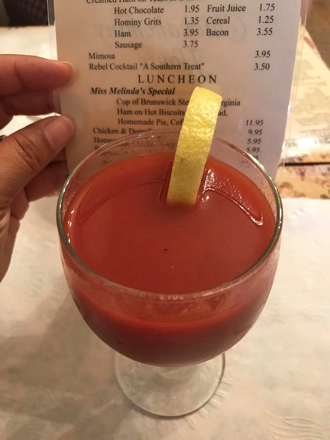 The Rebel Cocktail—a ruby-red Southern greeting with a lemon twist. Not all revolutions in Virginia involve muskets; some come in glassware.
