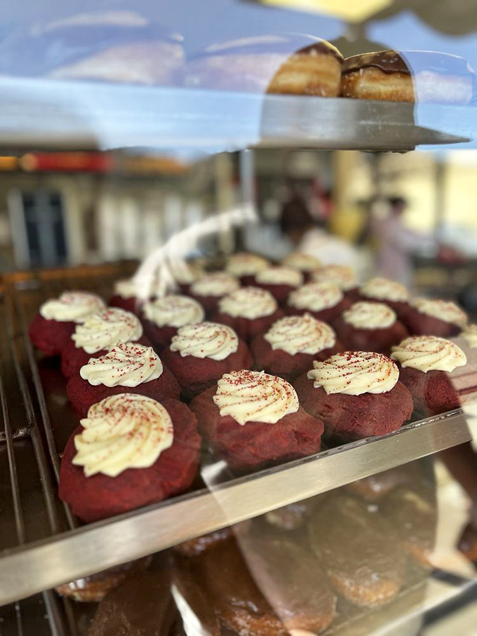 Red velvet beauties topped with cream cheese frosting&mdash;like tiny edible pillows designed for your taste buds, not your head.