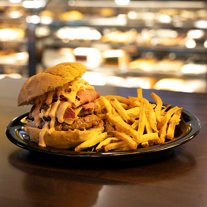 This isn't just a burger&mdash;it's a cultural fusion masterpiece where the Reuben sandwich and the American classic have created delicious offspring.